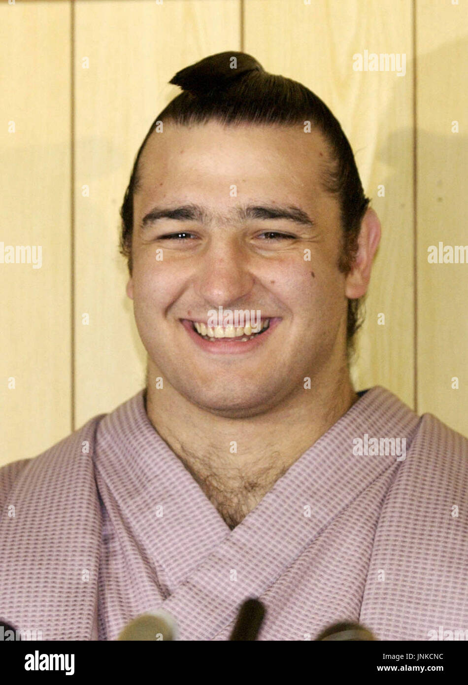 FUKUOKA, Japan - Bulgarian sumo wrestler Kotooshu smiles during a press ...