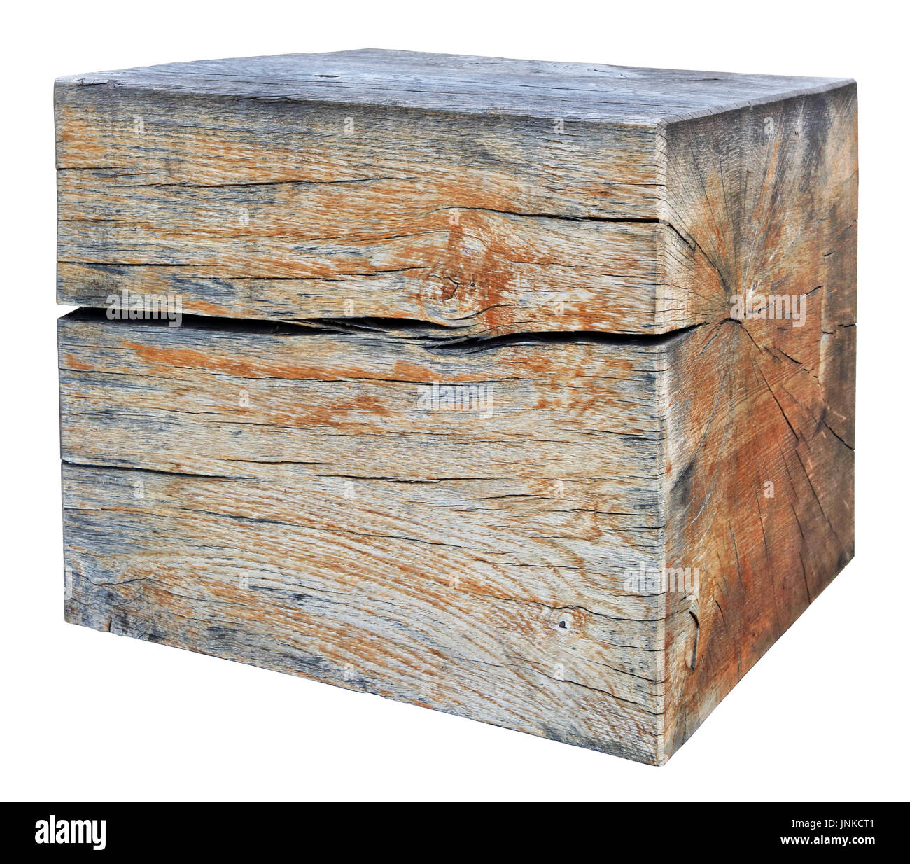 The big cube is cut out from a trunk of an old aged oak trunk. Isolated ...