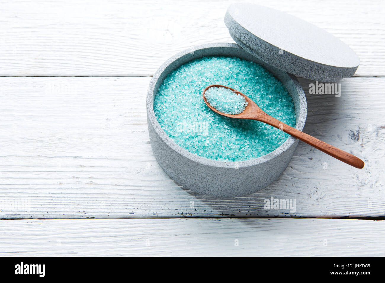 Salt for bath in cup Stock Photo - Alamy