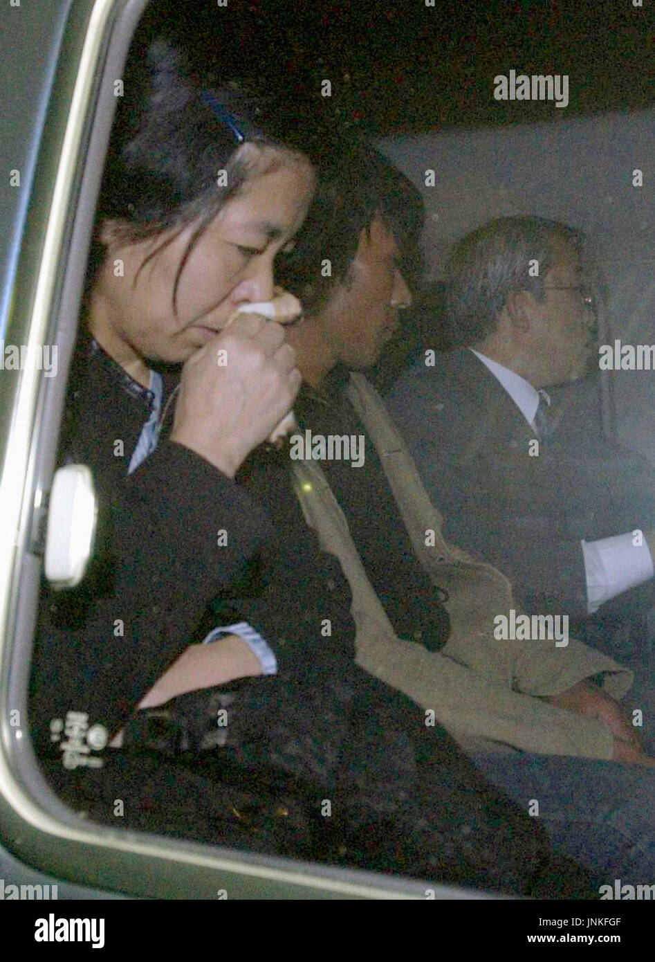 TOKYO, Japan - Kidnapping victim Shosei Koda's mother Setsuko (L) cries ...