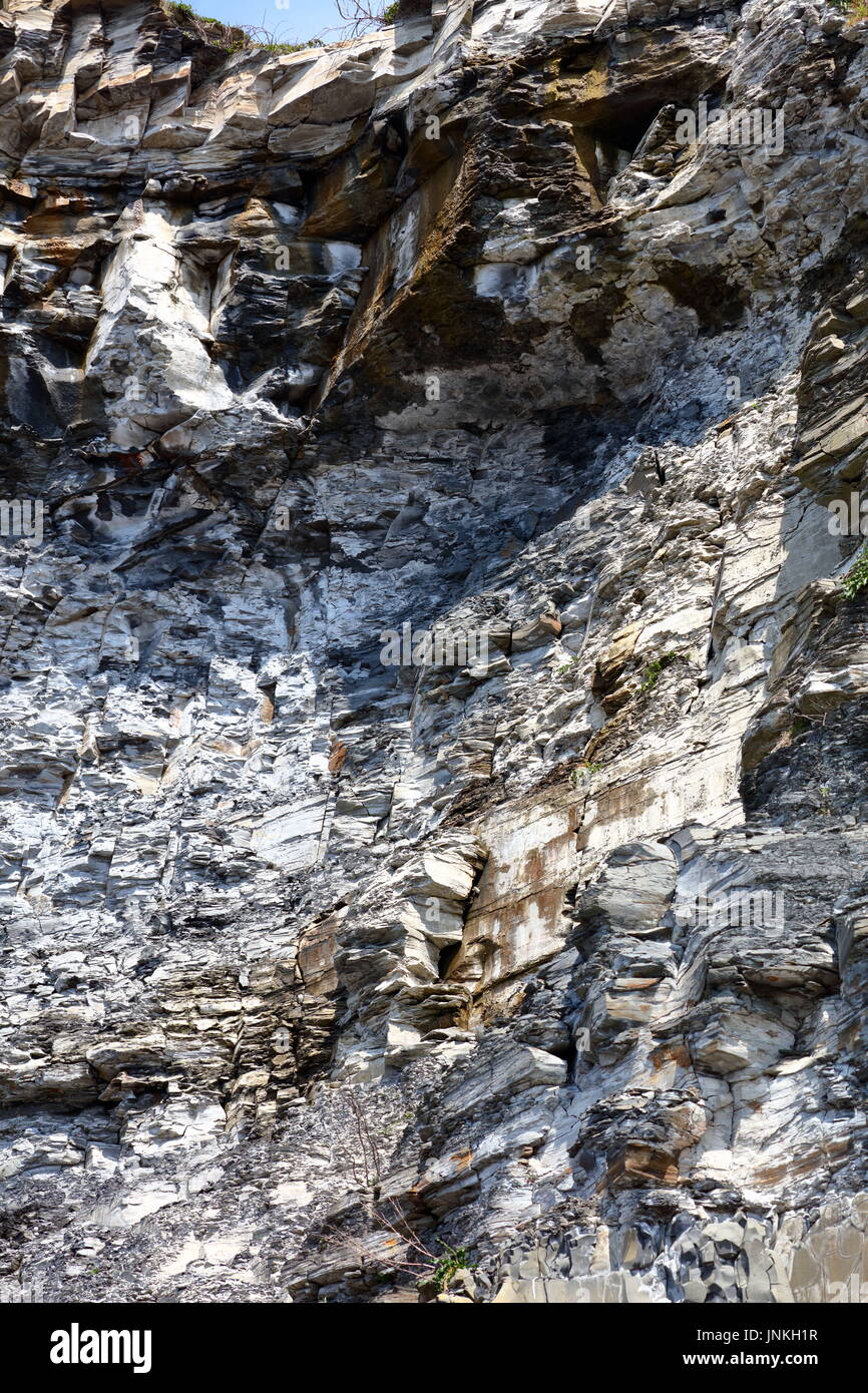 Geological cliff structures with limestone and soft crumbling oil ...
