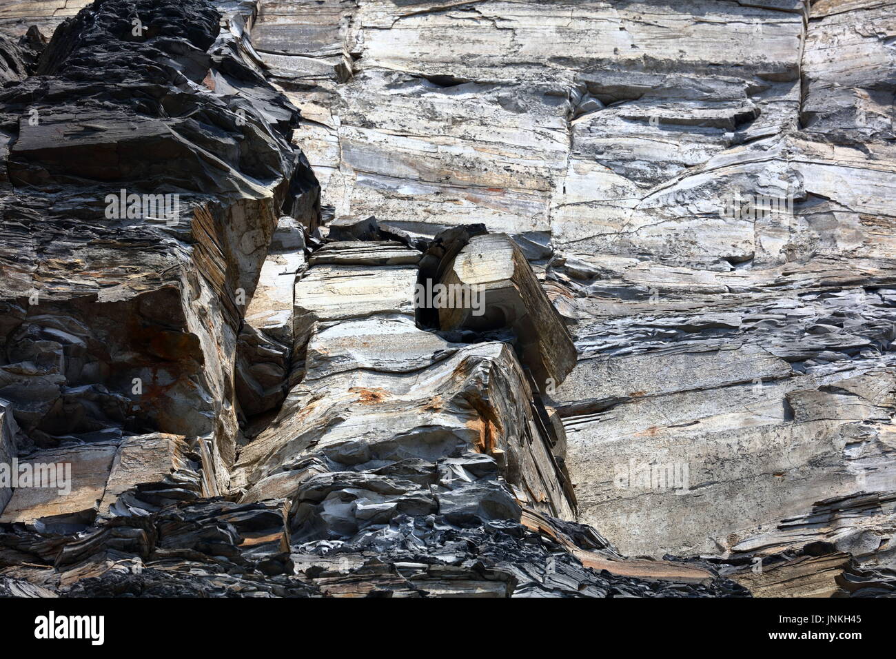 Geological cliff structures with limestone and soft crumbling oil ...