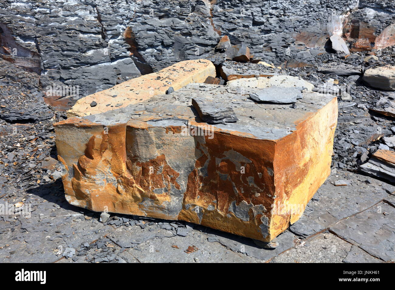 Massive mineral stained limestone block recently broken away from ...