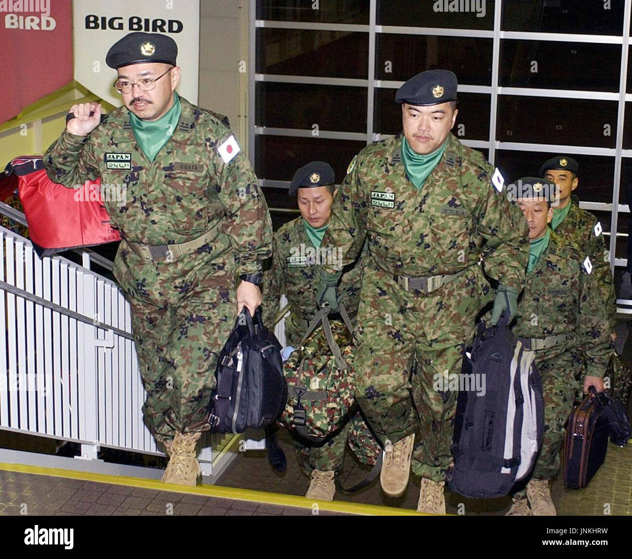 TOKYO, Japan - A group of Ground Self-Defense Force members prepare to ...