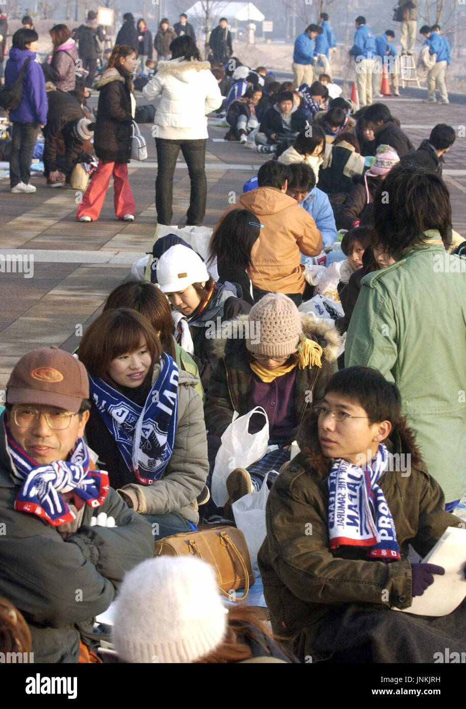 SAITAMA, Japan - Soccer fans form long queues around Saitama Stadium on ...