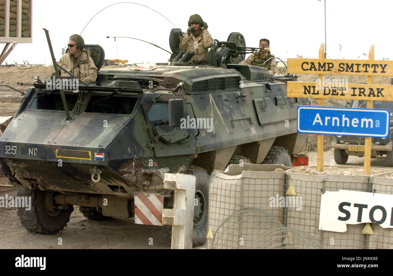 SAMAWAH, Iraq - An armed Dutch vehicle leaves Camp Smitty outside ...