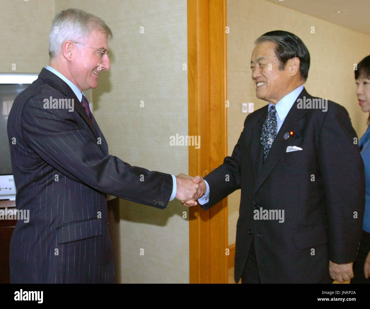 DALIAN, China - Japanese farm minister Yoshinobu Shimamura (R) and Tim ...
