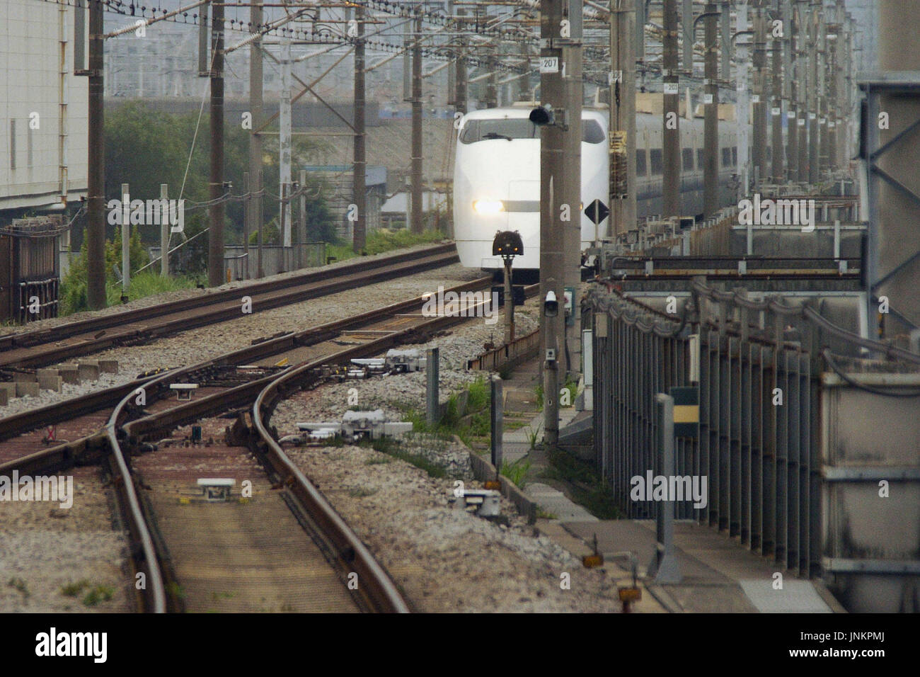 TOKYO, Japan - A bullet rain on the Tokaido Shinkansen Line stops near ...