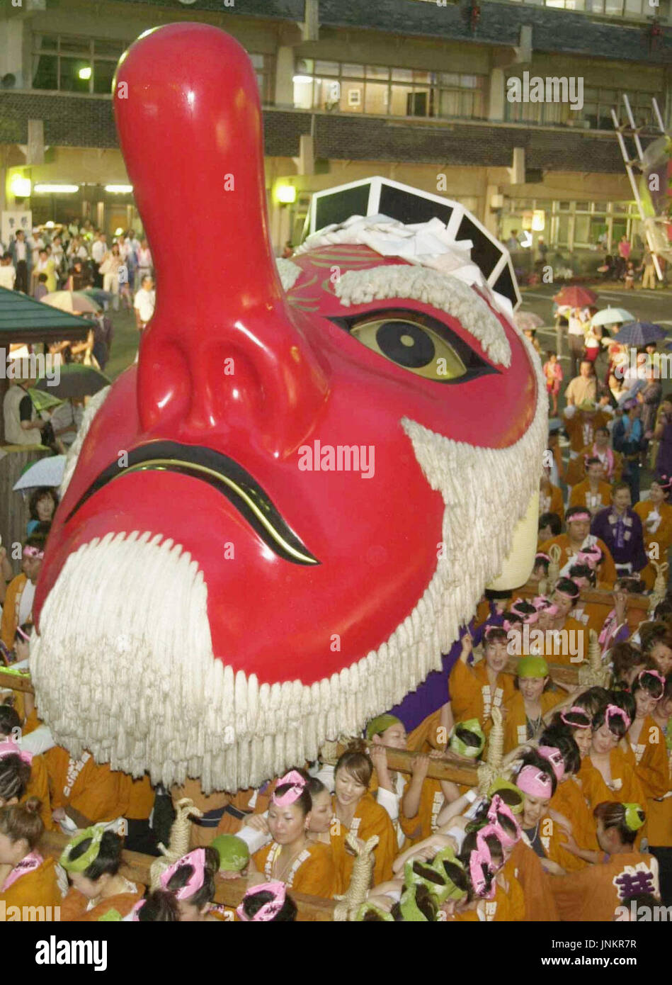 NUMATA, Japan - About 200 women carry a portable shrine featuring ...