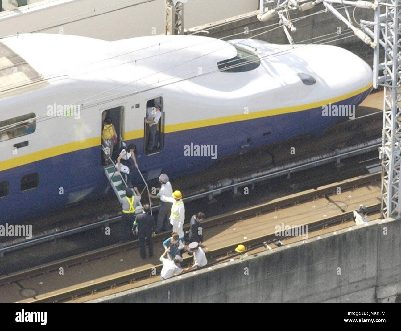 SENDAI, Japan - Passengers get out of a bullet train on the Tohoku ...