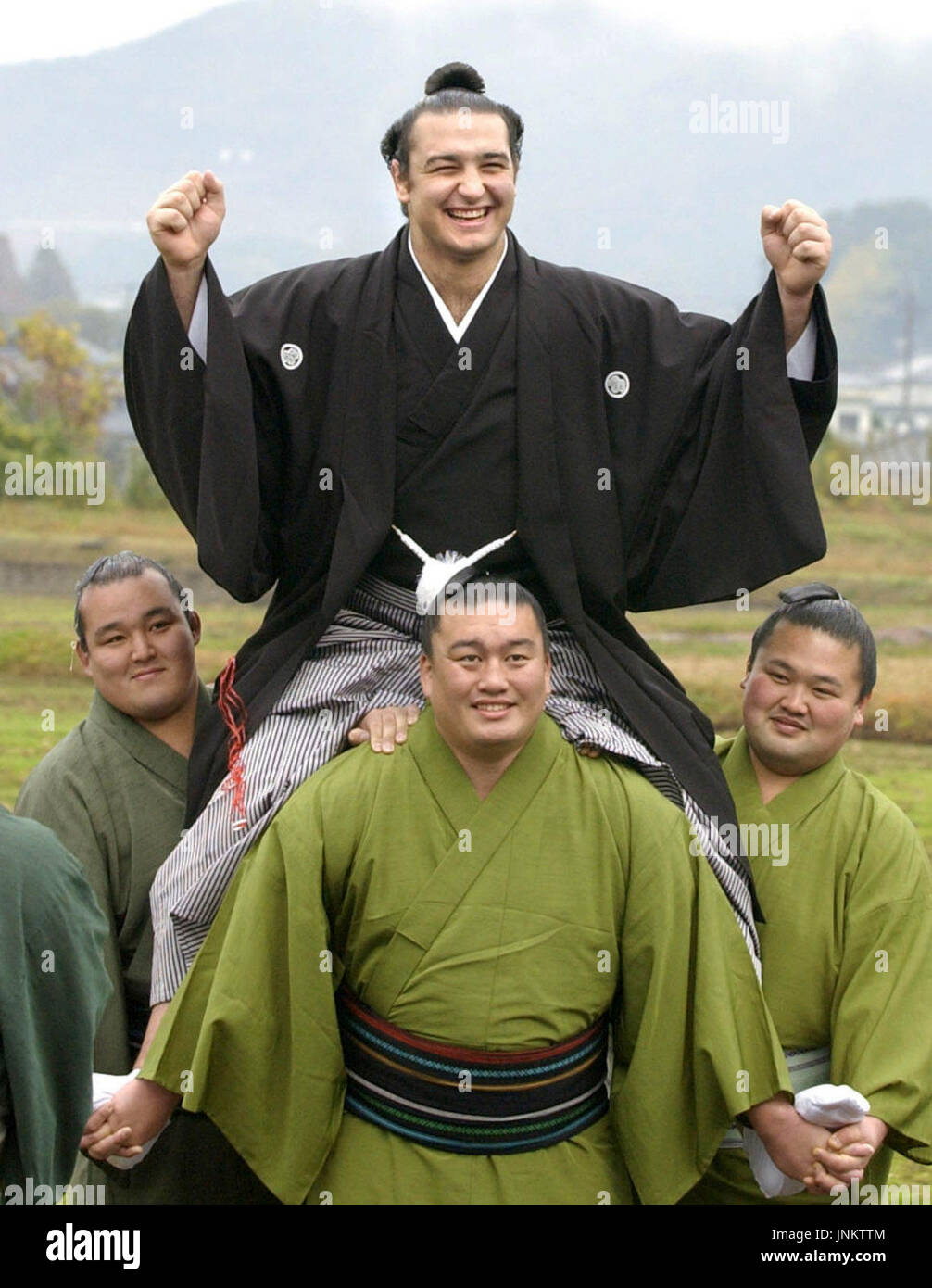 FUKUOKA, Japan - Bulgarian sumo wrestler Kotooshu poses with junior ...