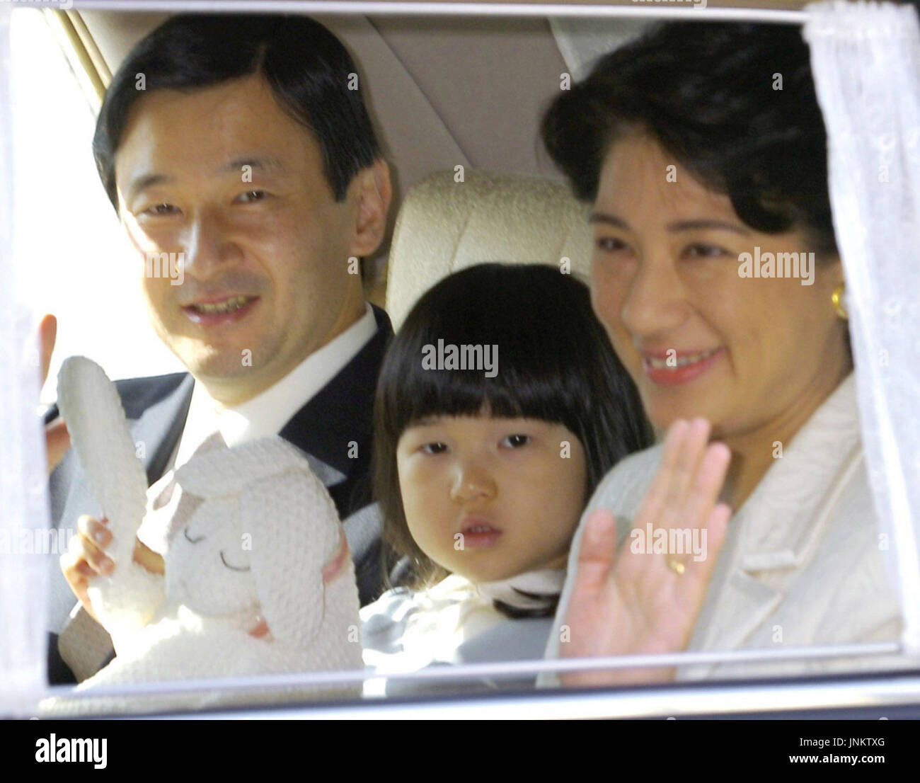 TOKYO, Japan - Princess Aiko, sandwiched between her father Crown ...