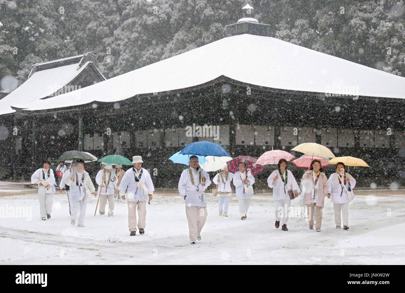 KOYA, Japan - Pilgrims brave the year's first snow on Mt. Koya in ...