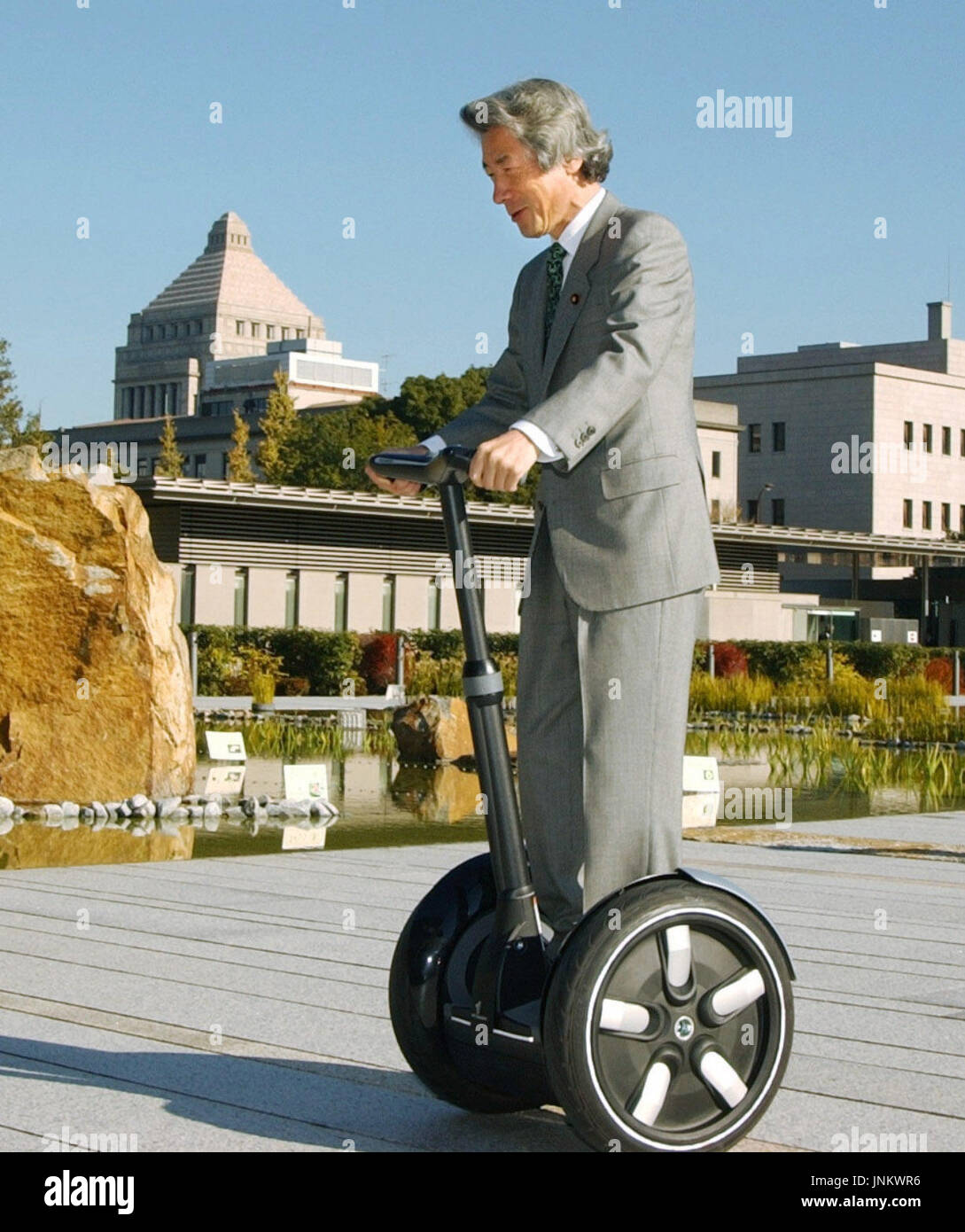 TOKYO, Japan - Prime Minister Junichiro Koizumi rides a Segway scooter ...