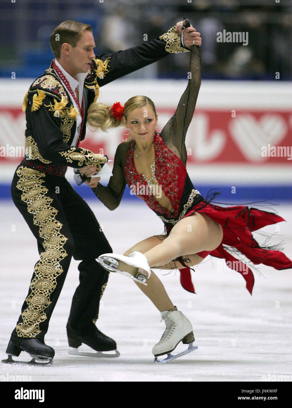 TOKYO, Japan - Tatiana Navka and Roman Kostomarov of Russia claim the ...