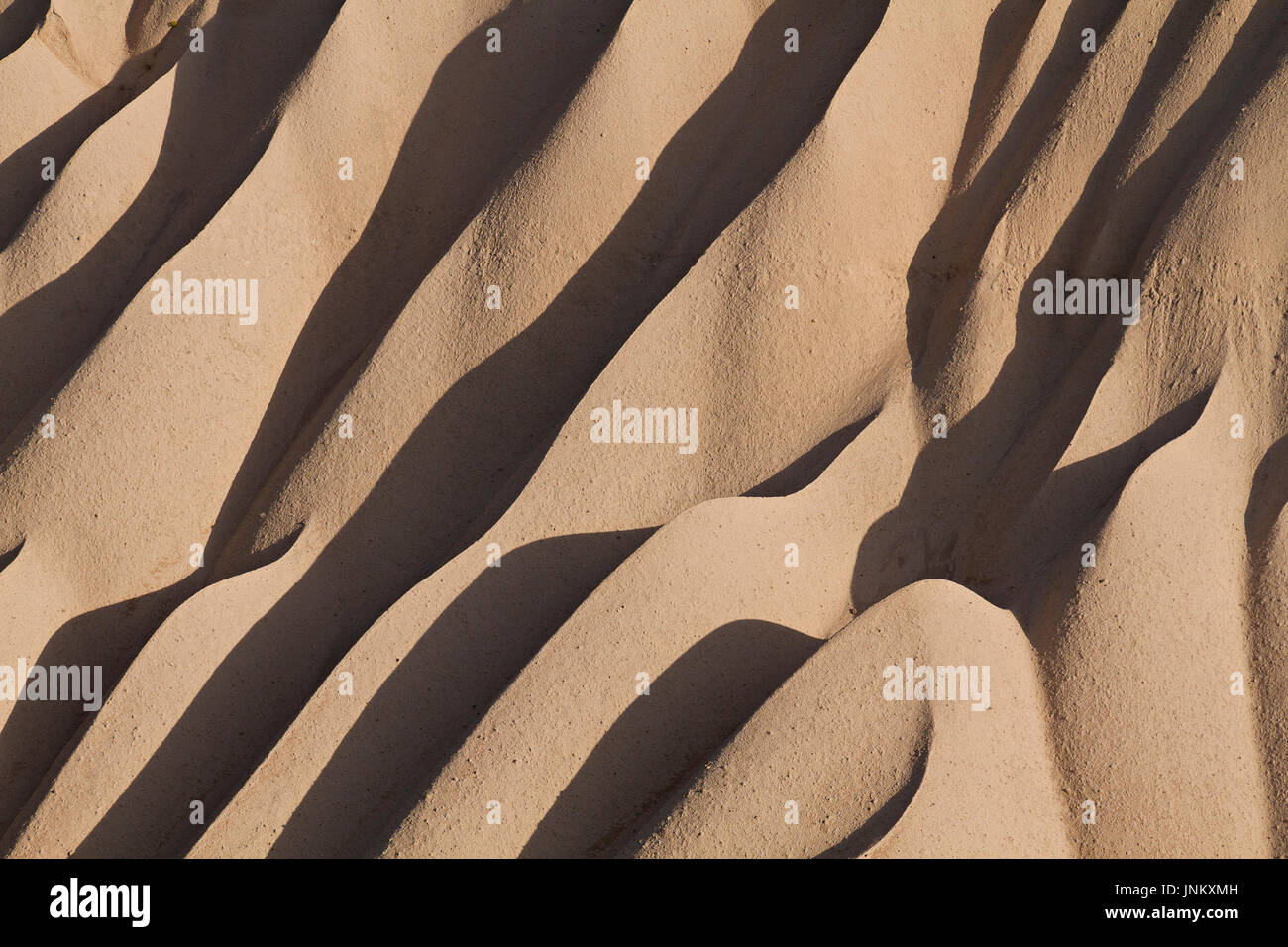 Volcanic ash formations looking like sand dunes in Cappadocia, Turkey ...