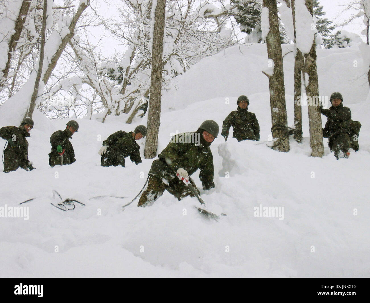 TSUNAN, Japan - Ground Self-Defense Force troops remove heavy snow ...