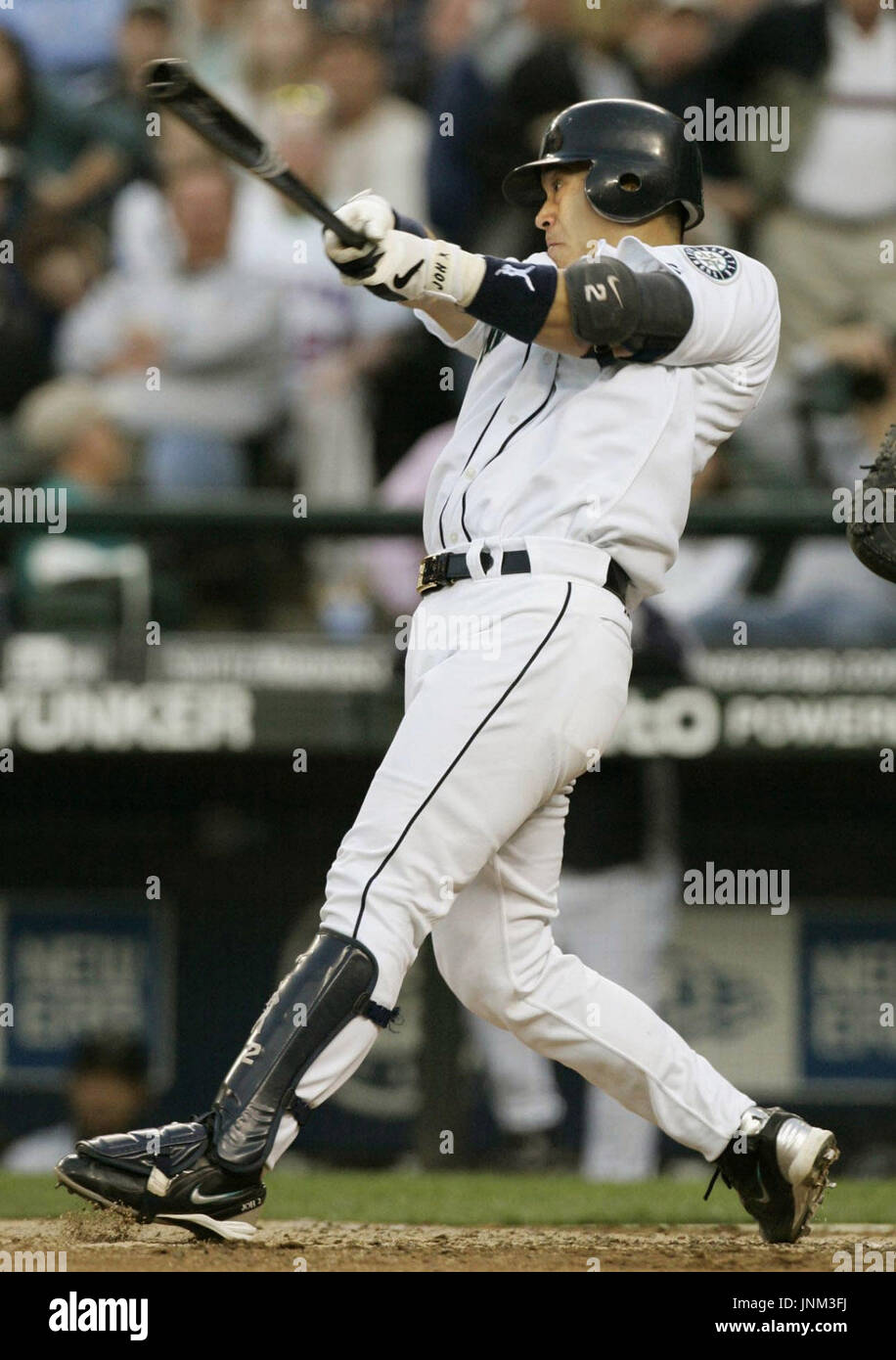 SEATTLE, Unites States - Seattle Mariners catcher Kenji Jojima hits a ...