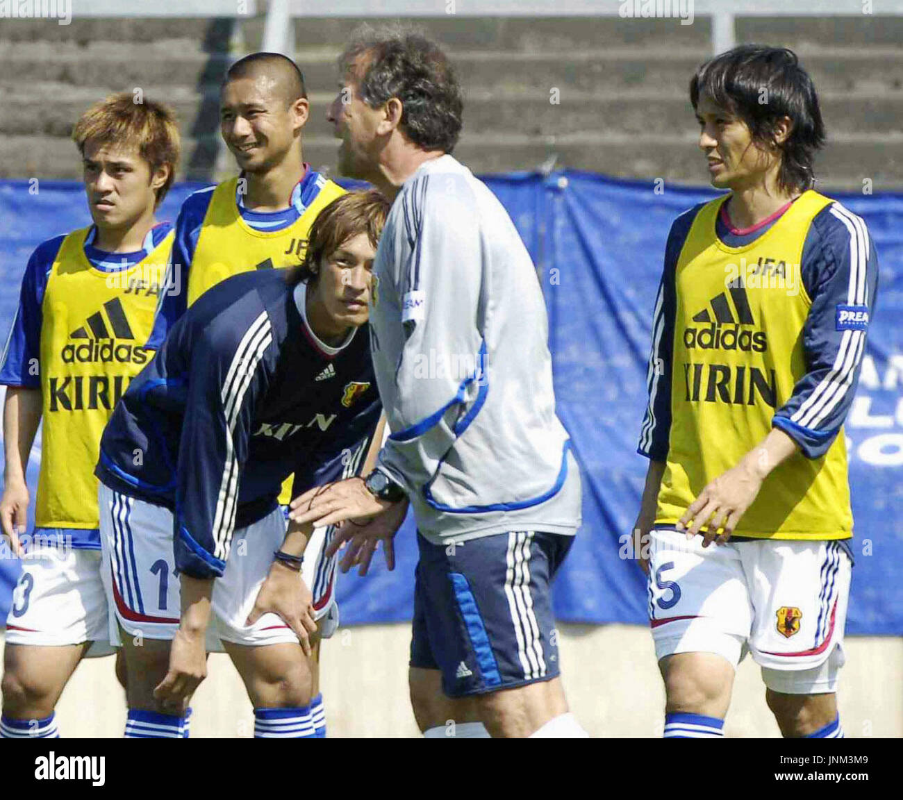 BONN, Germany - Japan defenders Yuichi Komano (far left), Keisuke Tsuboi (2nd from L), striker ...