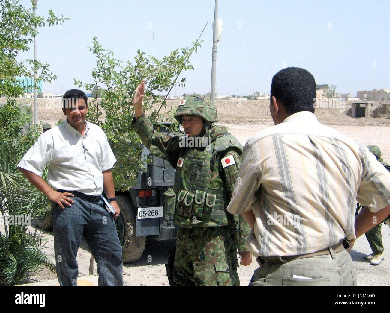 SAMAWAH, Iraq - A Japanese Ground Self-Defense Force member salutes ...