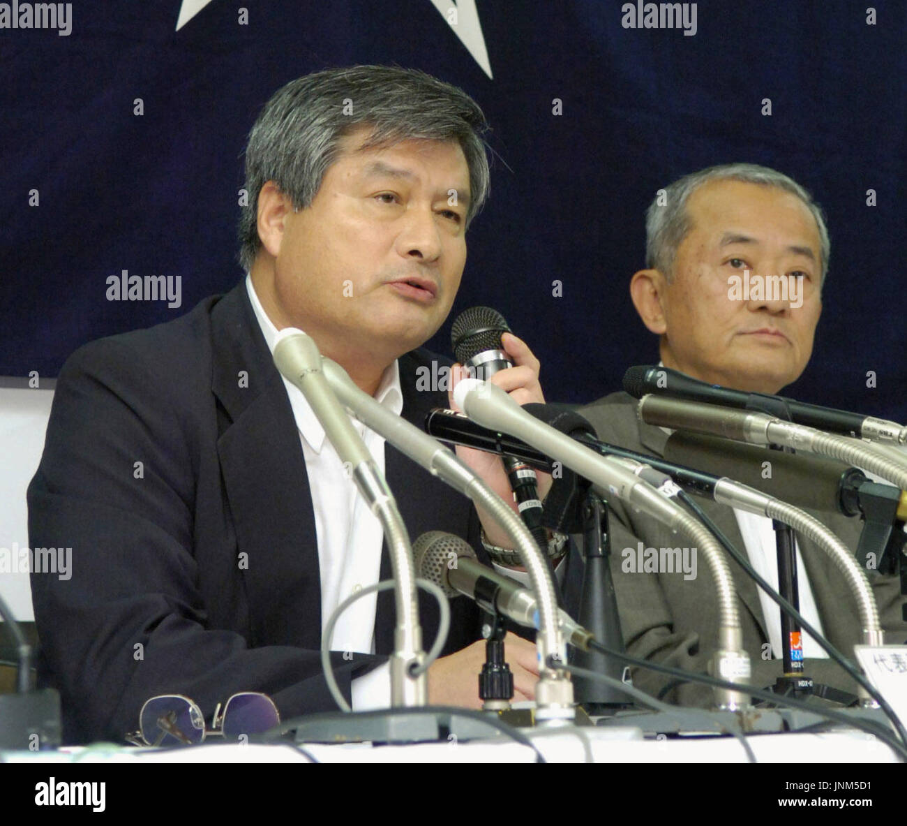 TOKYO, Japan - Hokuetsu Paper Mills Ltd. President Masaaki Miwa (L ...