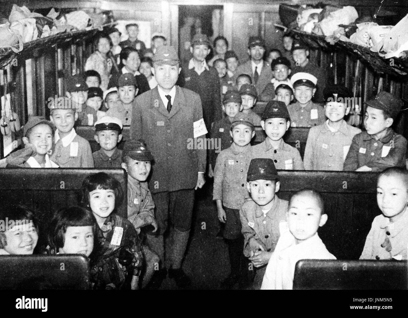 TOKYO, Japan - Schoolchildren inside the train are being evacuated for ...
