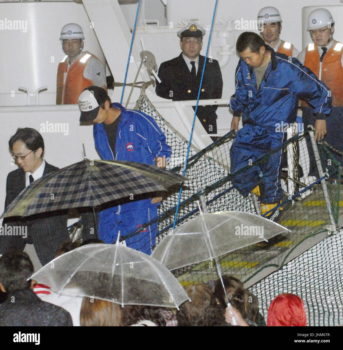 NEMURO, Japan - Akiyoshi Kawamura (capped) and Haruki Kamiya disembark ...