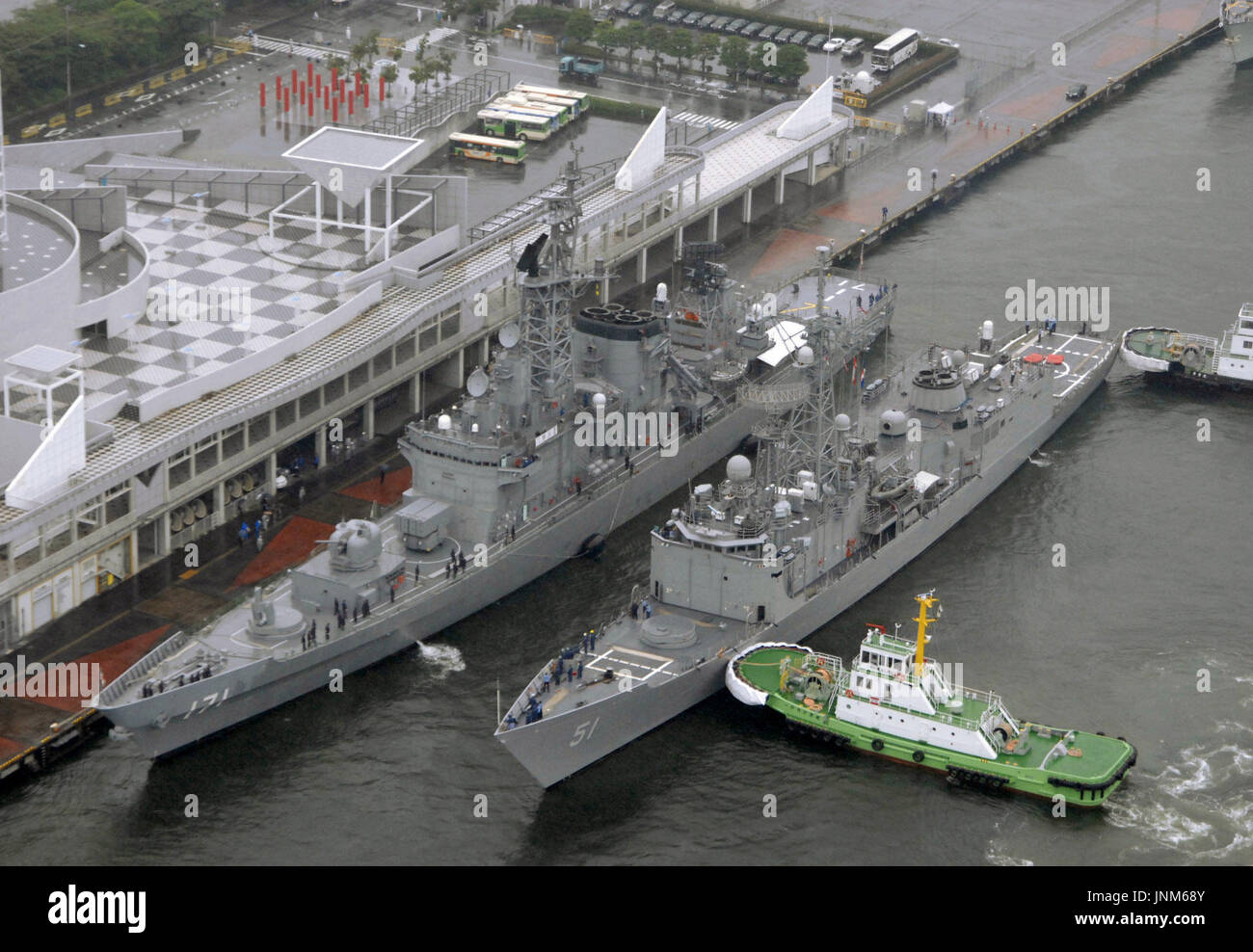 TOKYO, Japan - A frigate ship (R) from the U.S. 7th Fleet joins ...