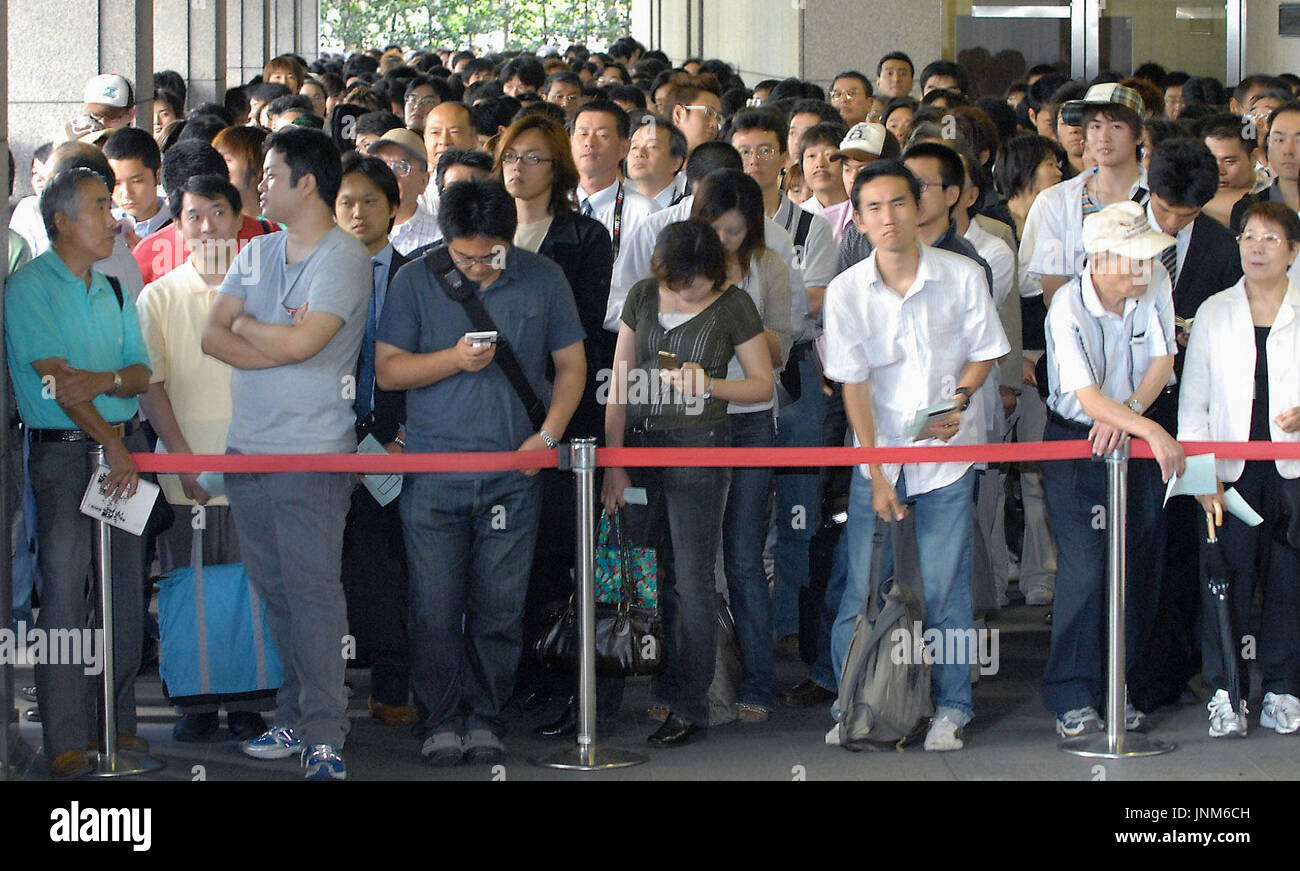 TOKYO, Japan - A long line forms in front of the Tokyo District Court ...