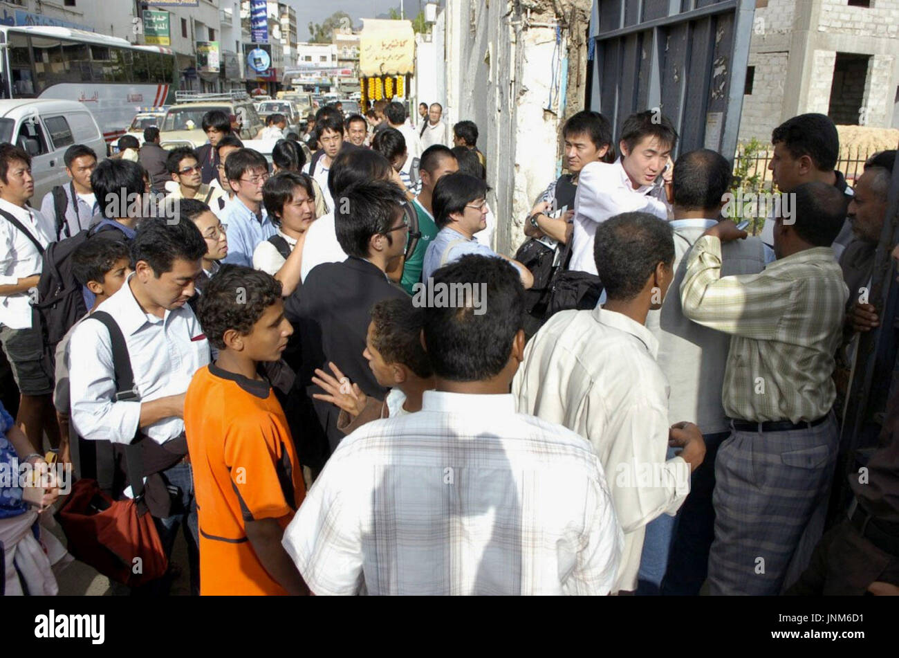 SANA'A, Yemen - Reporters are stranded outside a soccer stadium in Sana ...