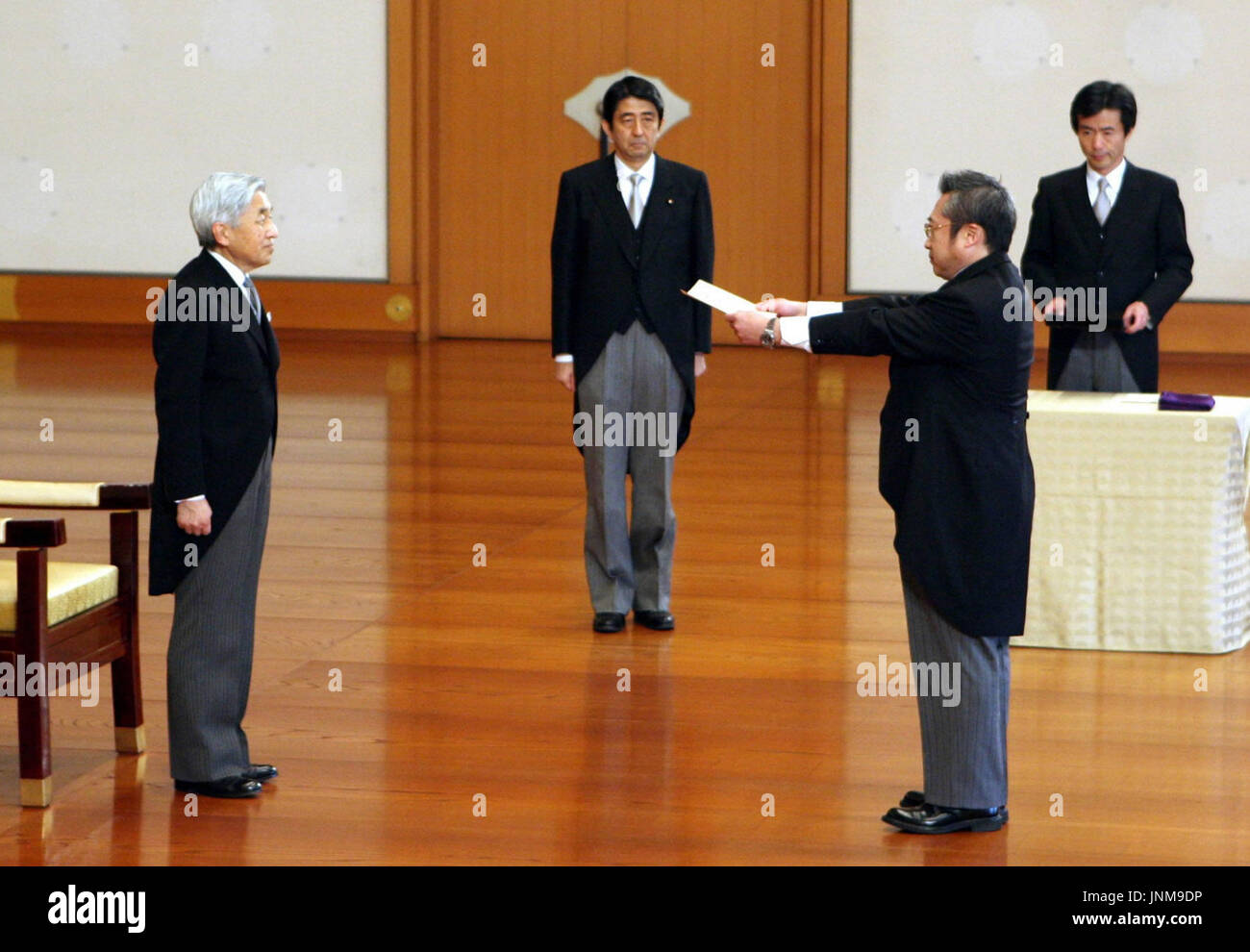 TOKYO, Japan - Lawmaker Yoshimi Watanabe (R, front), who was appointed ...