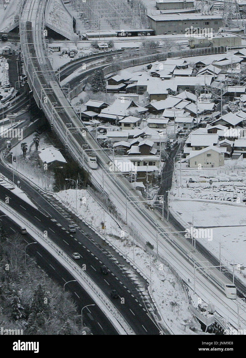 OSAKA, Japan - Snow blankets major rail and road arteries in the city ...