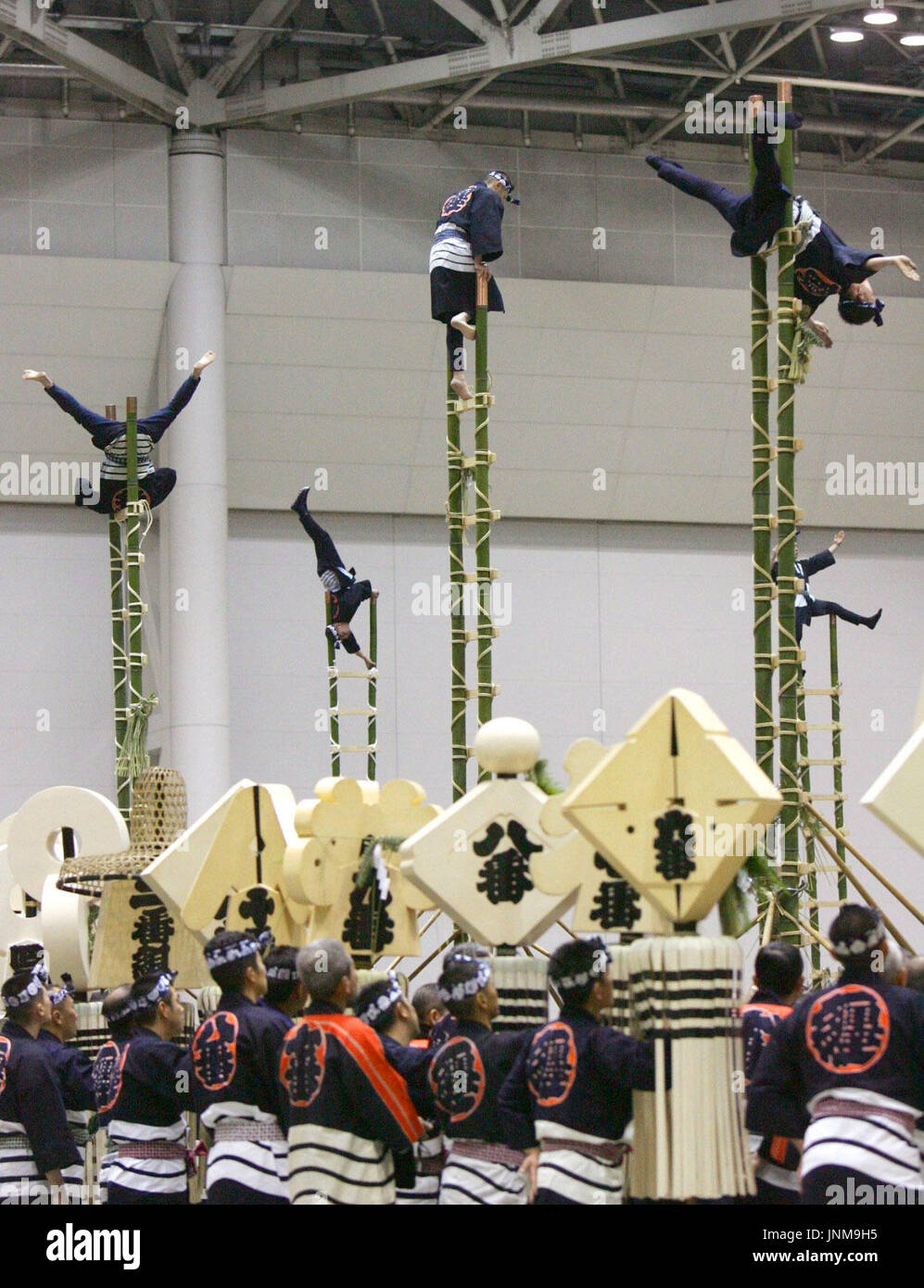 TOKYO, Japan - Firefighters display their traditional firefighting ...