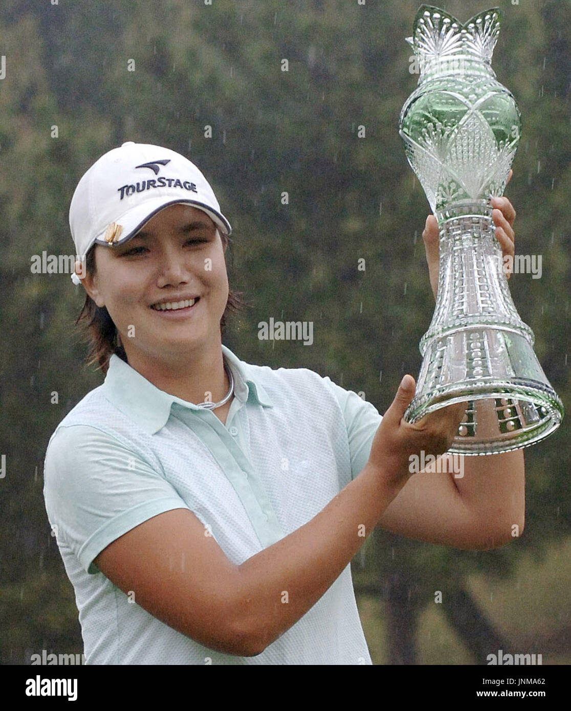 TOKYO, Japan - South Korean Jeon Mi Jeong smiles with her trophy in ...