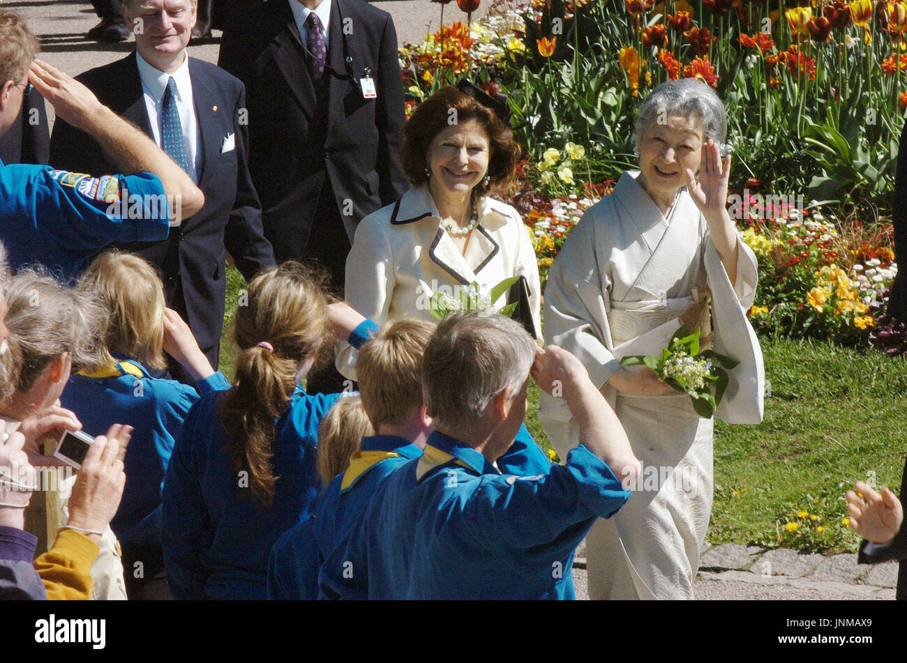 STOCKHOLM, Sweden - Japanese Empress Michiko waves to people after ...