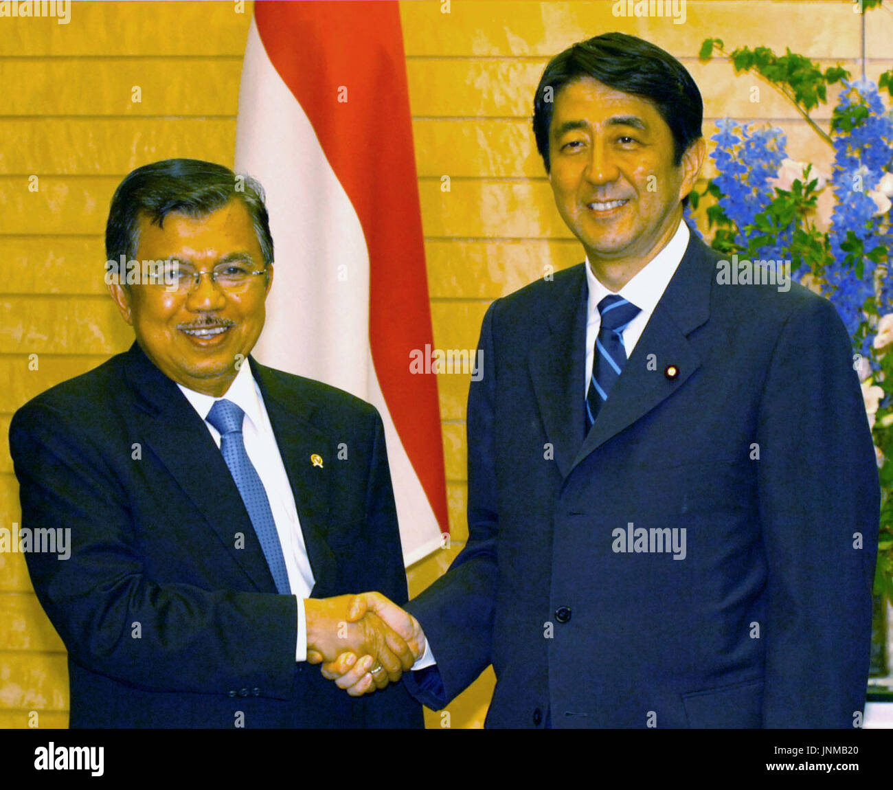 TOKYO, Japan - Indonesian Vice President Muhammad Yusuf Kala (L) and ...