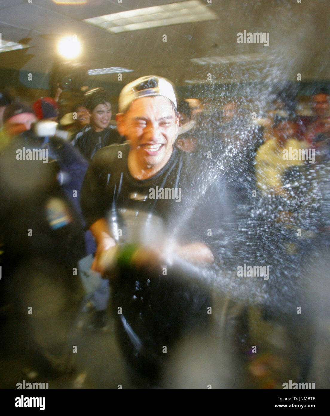 ANAHEIM, United States - Tadahito Iguchi celebrate with champagne after ...