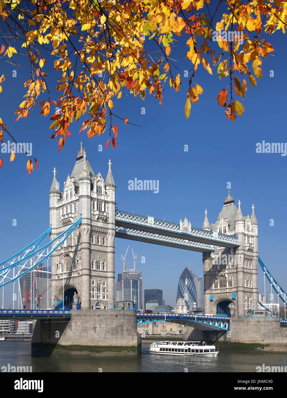 Famous Tower Bridge with autumn leaves in London, England, United ...