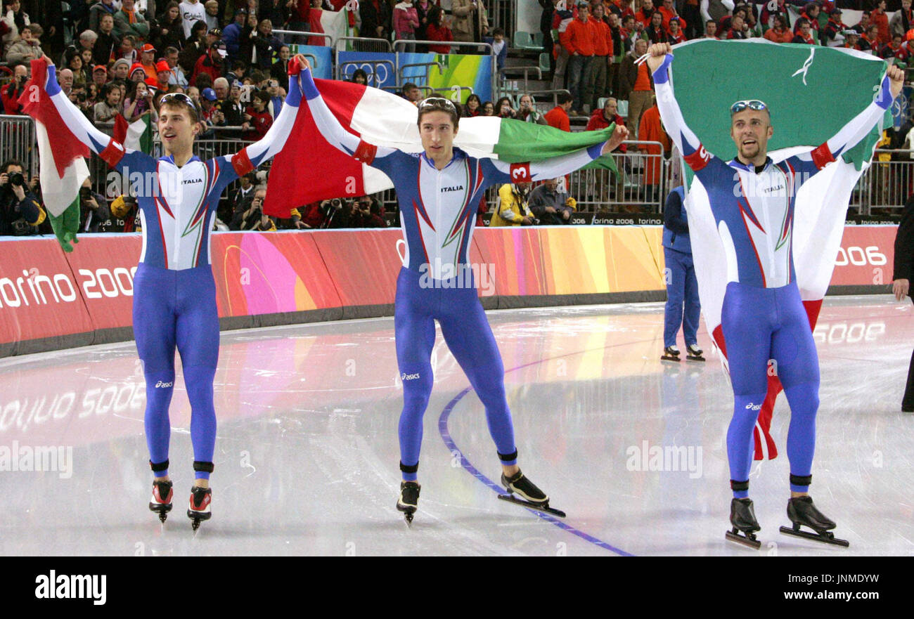 TURIN, Italy - The Italian men's team pursuit members, waving the ...