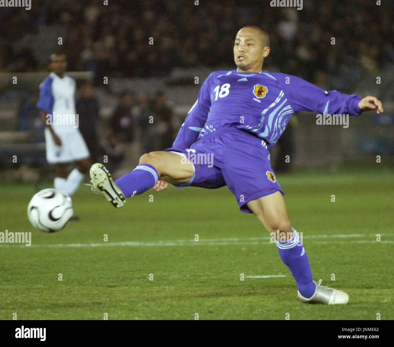 YOKOHAMA, Japan - Japan midfielder Shinji Ono scores Japan's first goal ...