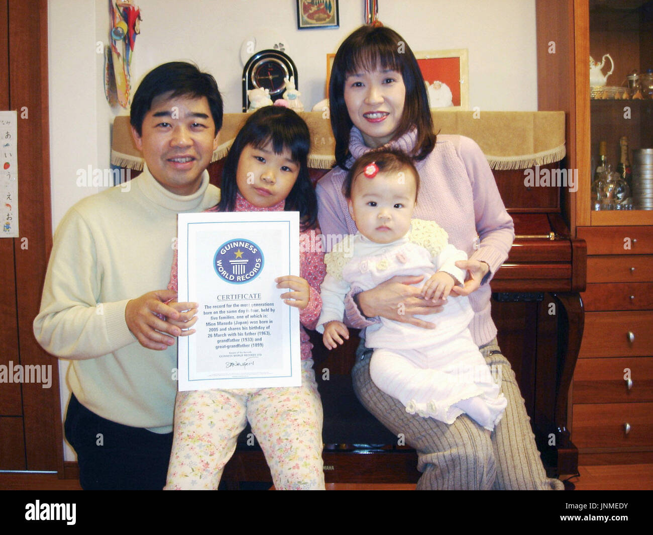 LONDON, England - Hiroshi Masuda (L) holds a Guinness World Records ...