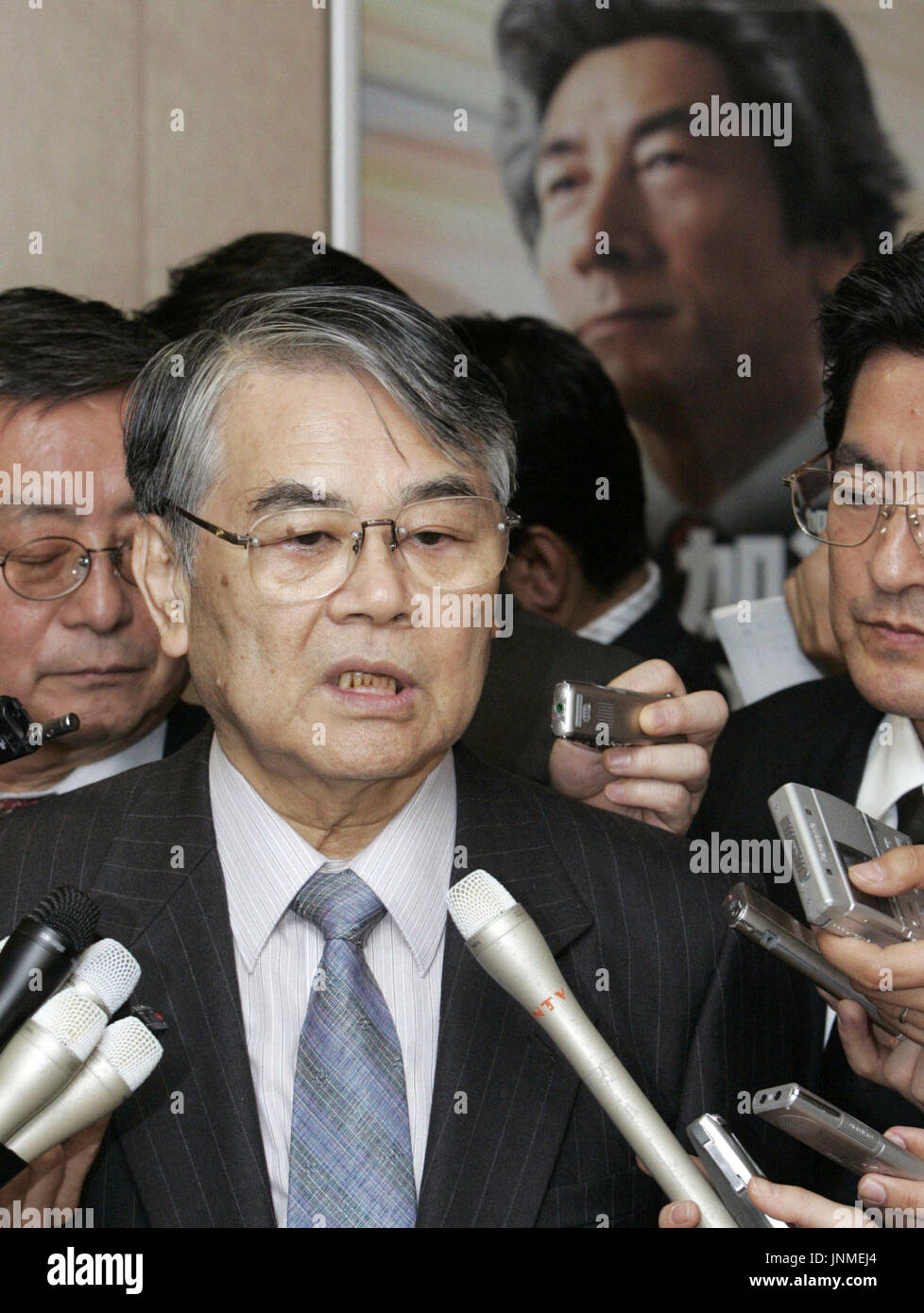 TOKYO, Japan - Okinawa Gov. Keiichi Inamine speaks to reporters at ...