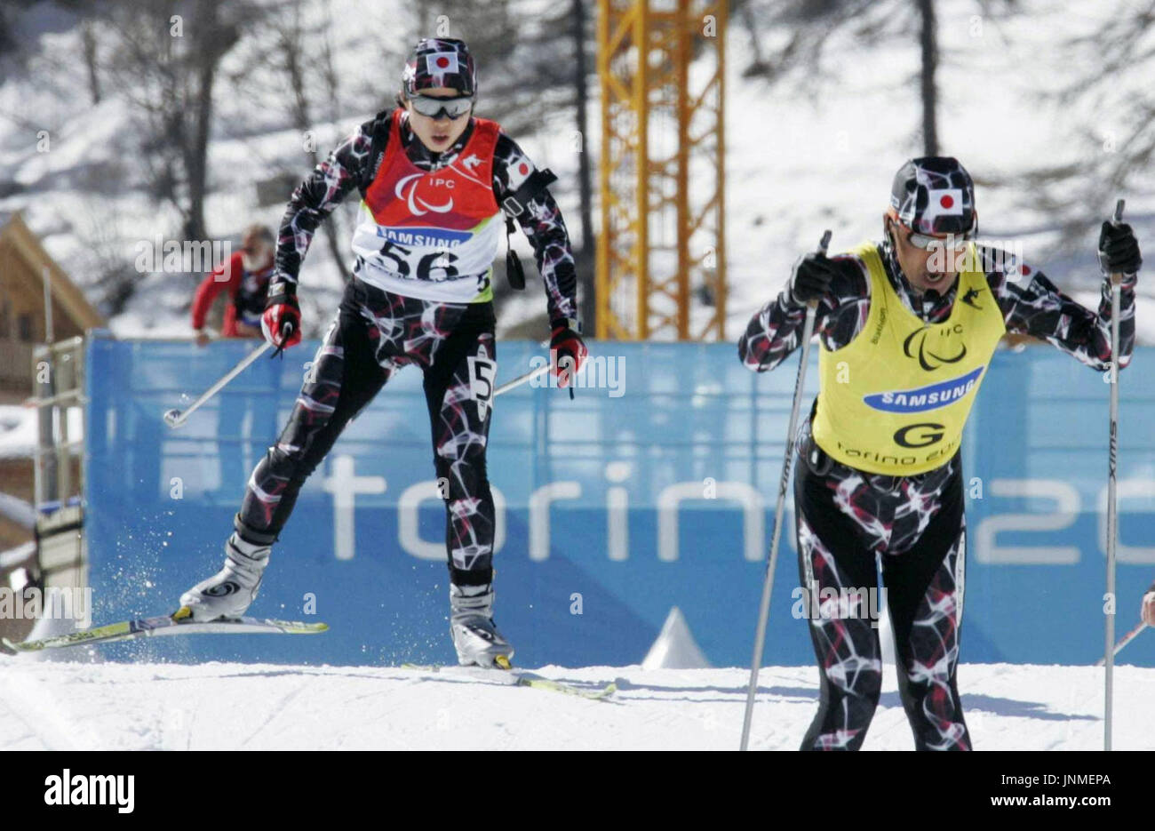 PRAGELATO, Italy - Japan's Miyuki Kobayashi, led by her guide Takashi ...