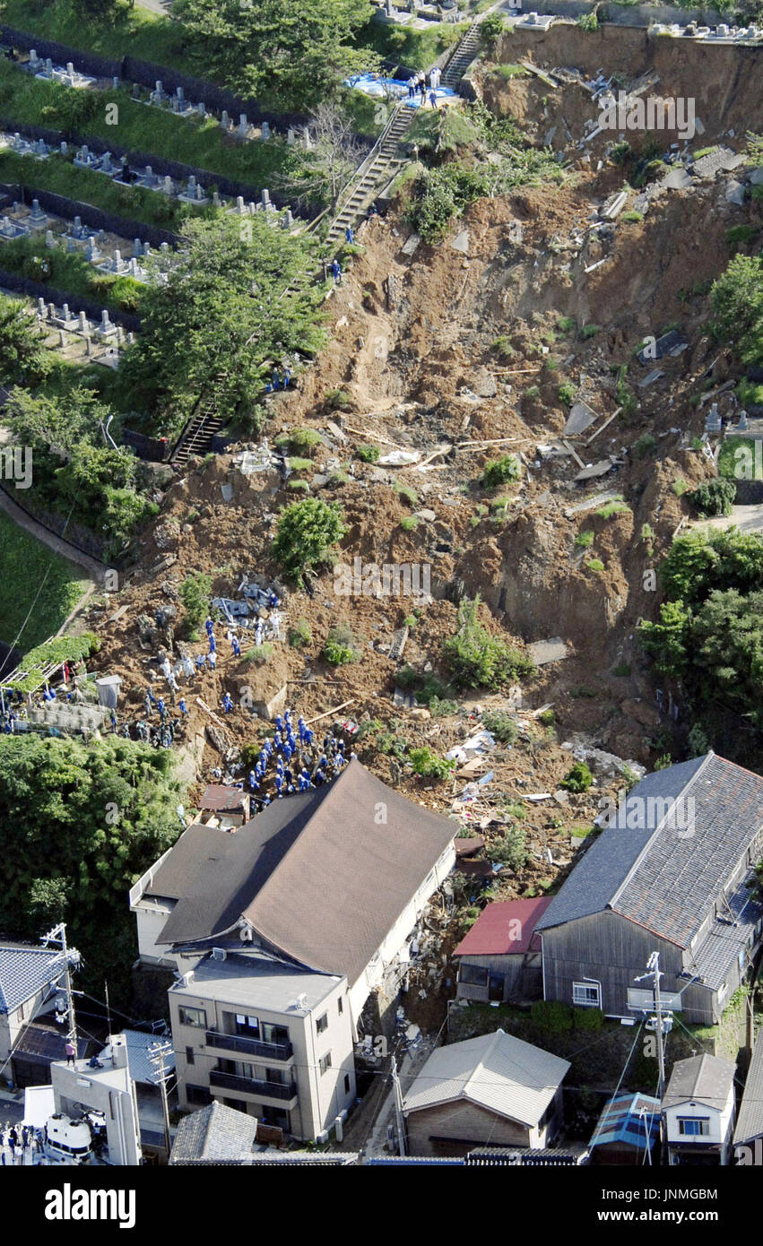 KYOTO, Japan - Mudslides triggered by heavy rainfalls threaten to bury ...