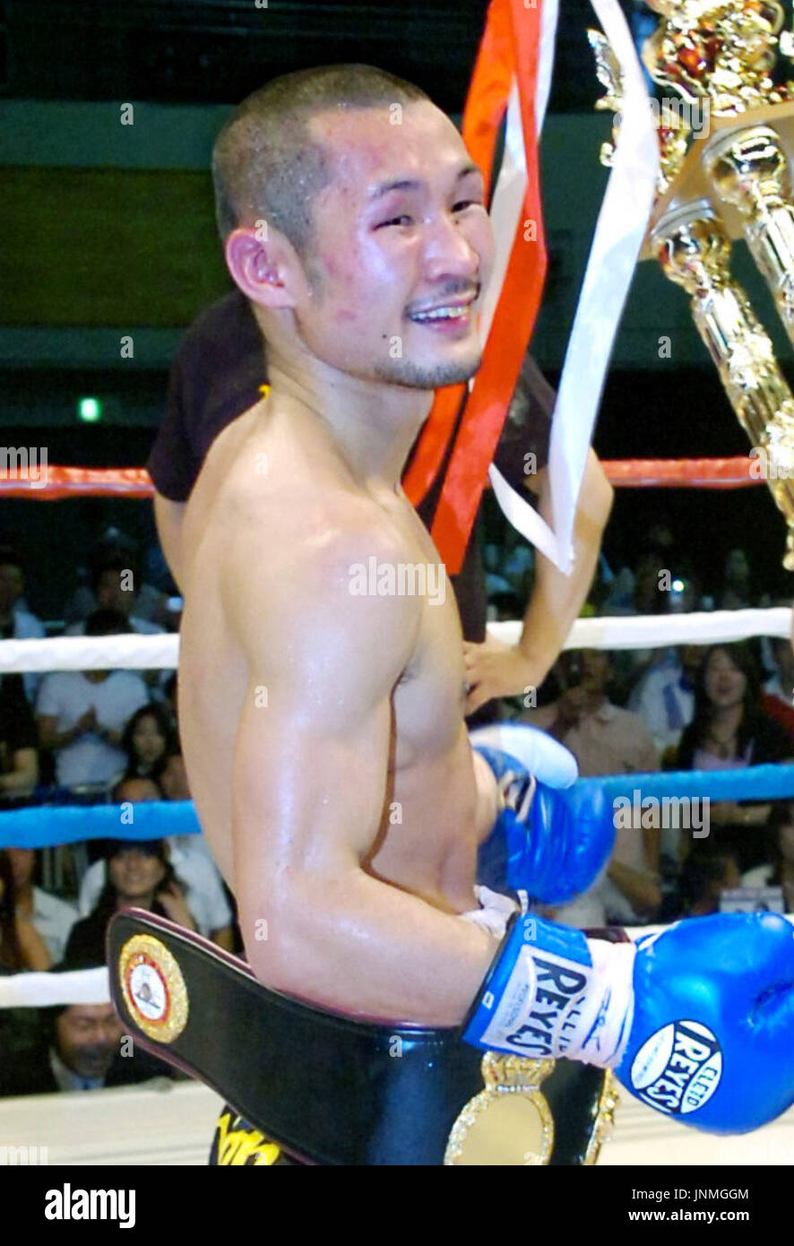 HIGASHI-OSAKA, Japan - Unbeaten Japanese boxer Nobuo Nashiro smiles ...