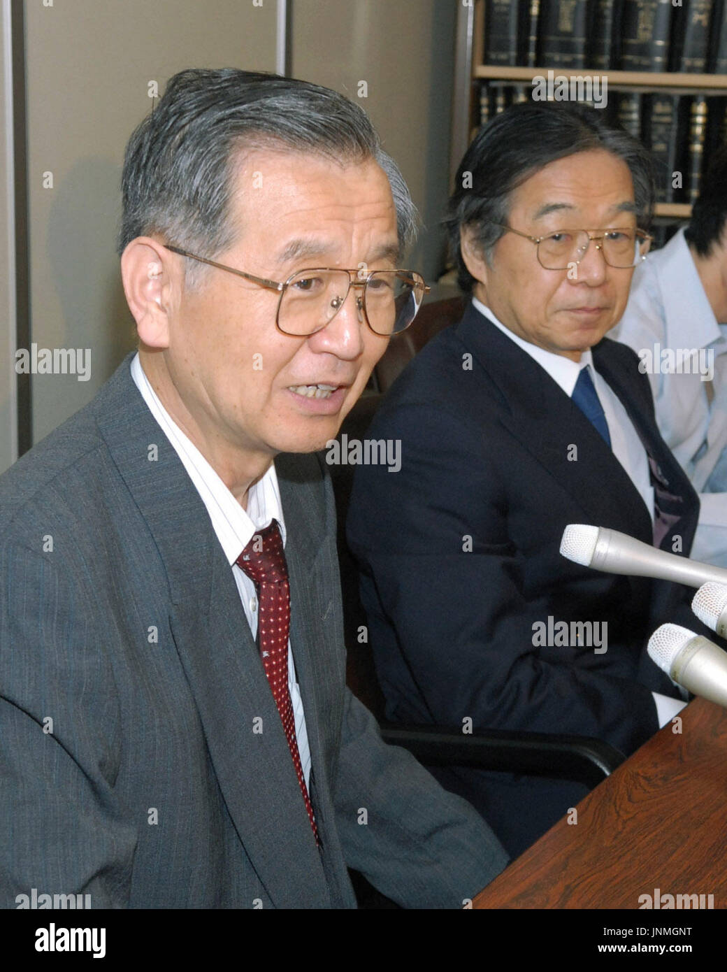 TOKYO, Japan - Fujio Masuoka (L) speaks to the press on July 27 after ...