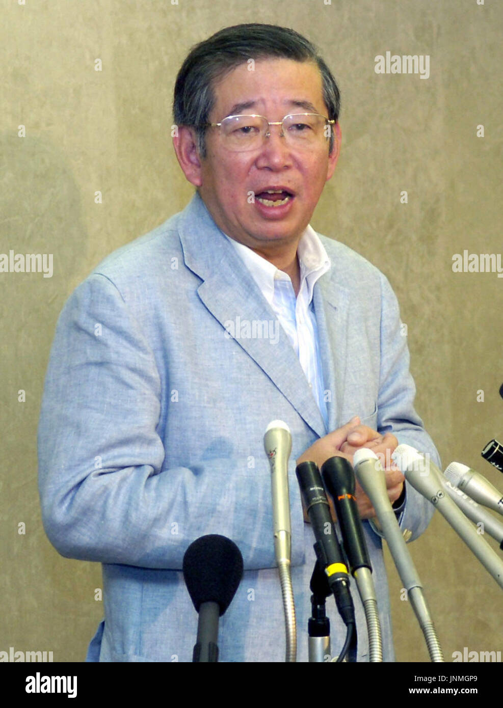 TOKYO, Japan - Health, Labor and Welfare Minister Jiro Kawasaki speaks ...