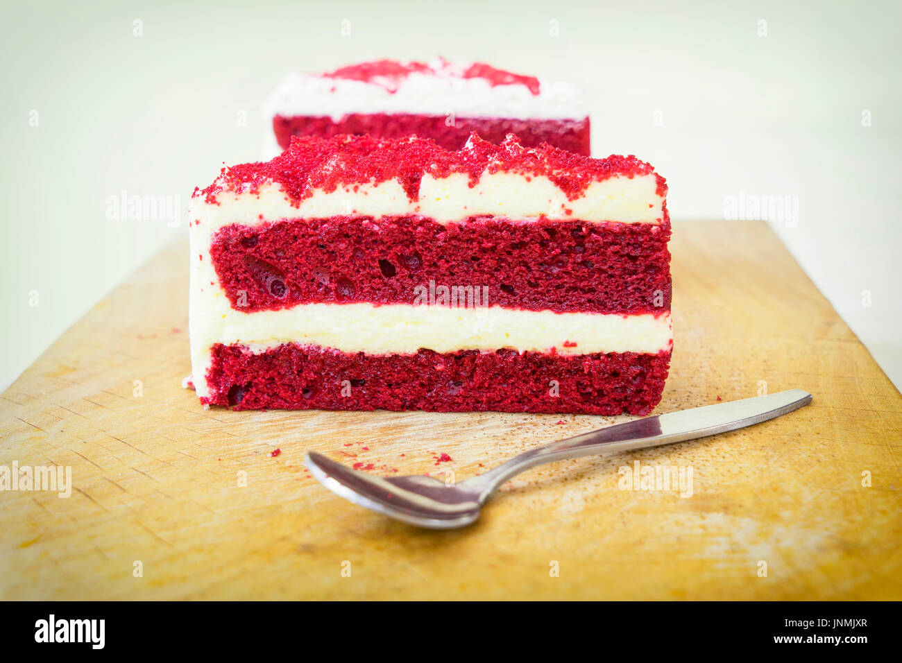 red velvet cake on wood plate for customer - can use to display or ...