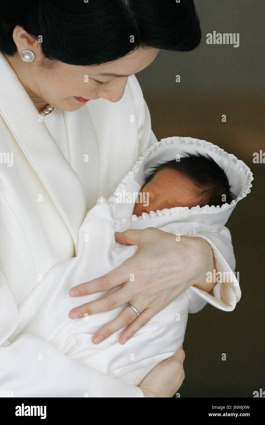 TOKYO, Japan - Princess Kiko tilts her newborn son Prince Hisahito ...