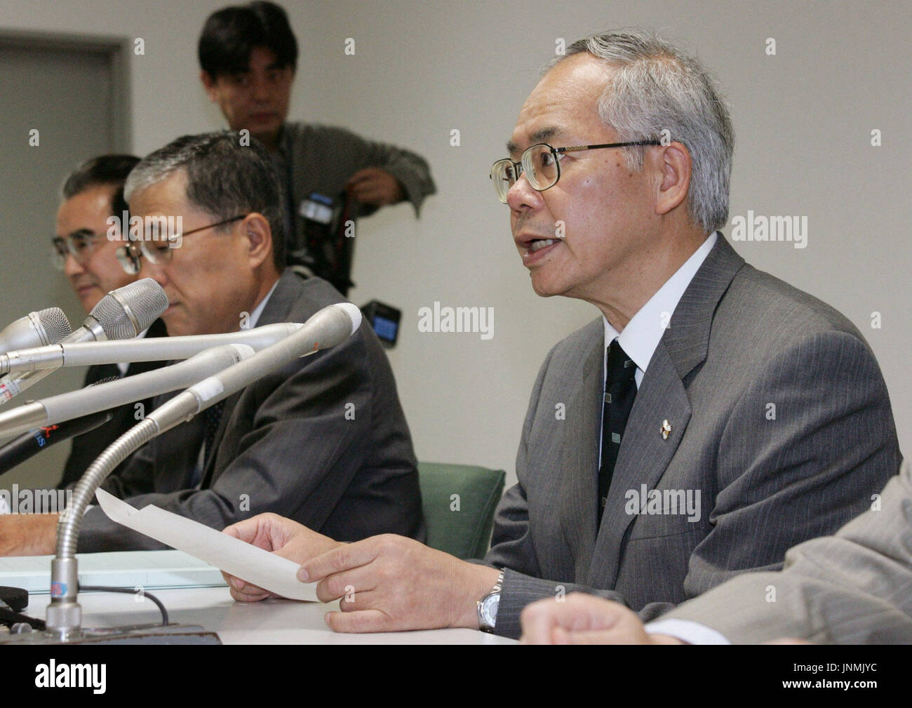 TOKYO, Japan - Tomoyuki Yokota (R), deputy prosecutor general at the Supreme Public Prosecutors ...